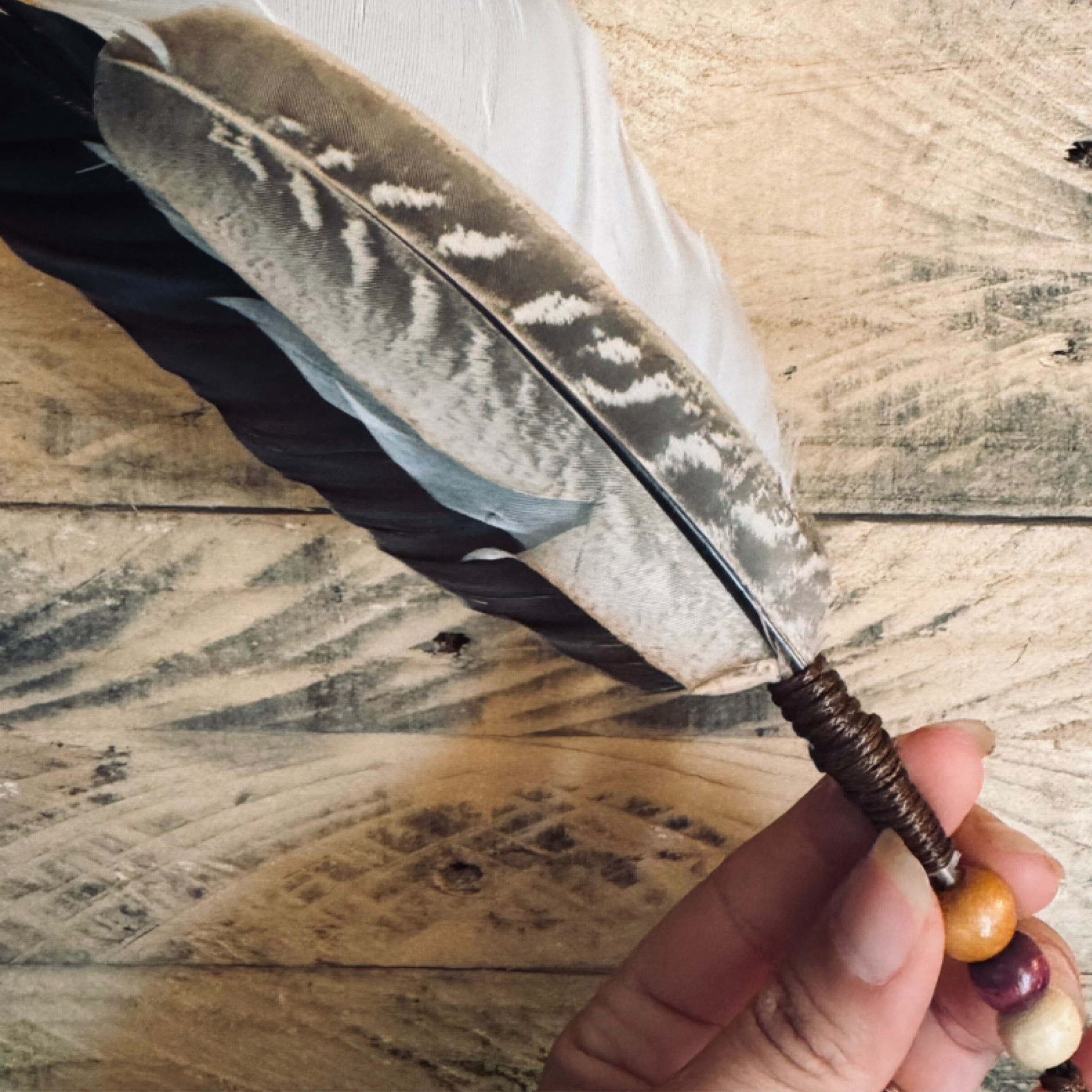 Handcrafted feather wand | The Held Space